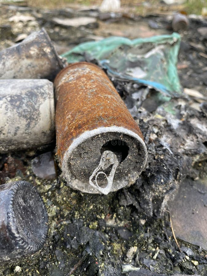 Rusty Can and Bottle on the Ground Stock Photo - Image of environment ...