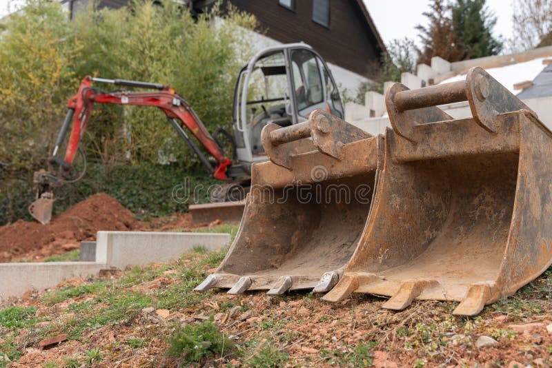 Close-up of Rusty Excavator Buckets Lying on the Ground at a ...