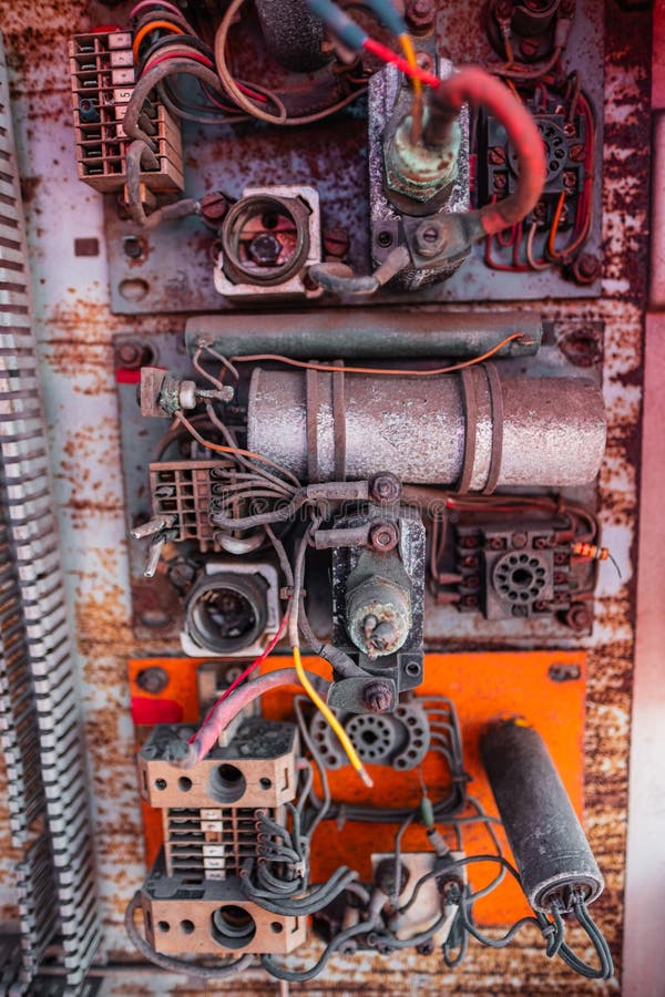 Close-Up of a Rusty Industrial Electrical Panel with Wires and ...