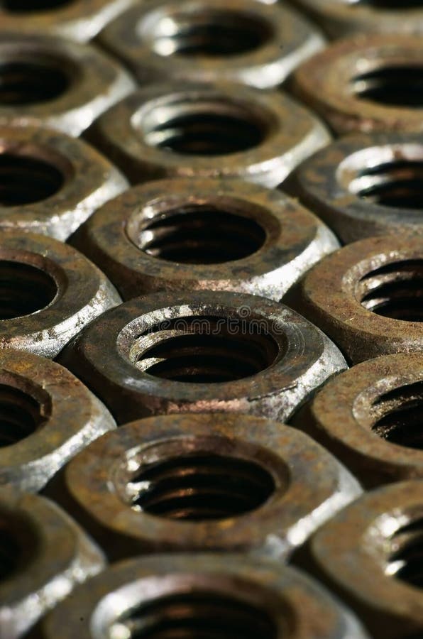 Close-up of rusty nuts stock image. Image of component - 117270527
