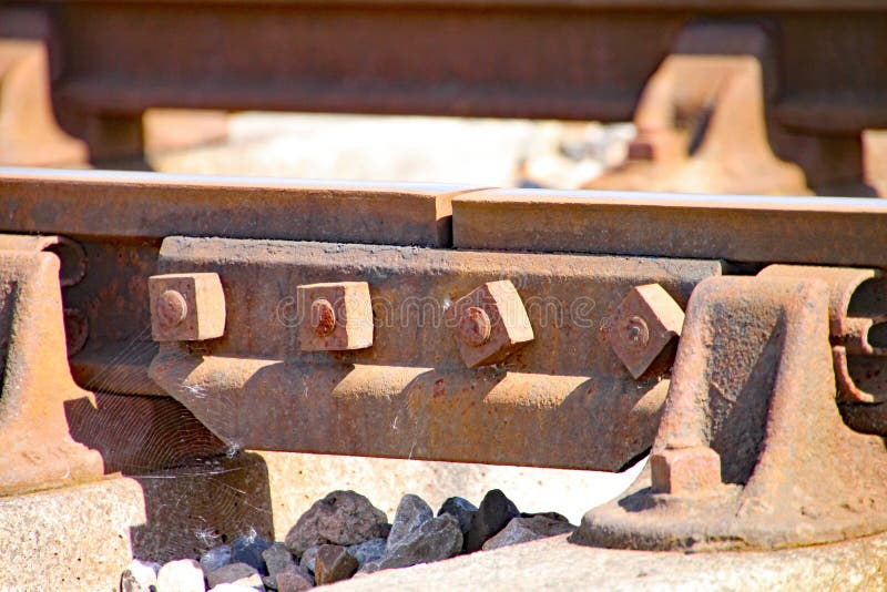 Close Up of Rusty Railway Track Showing the Nuts and Bolts of the ...