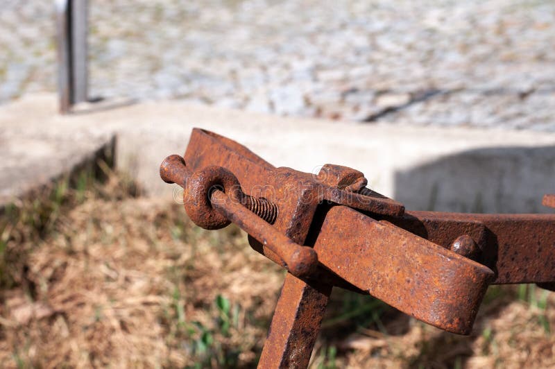 A Rusty Ring at an Old Plough Stock Photo - Image of grass, vintage ...
