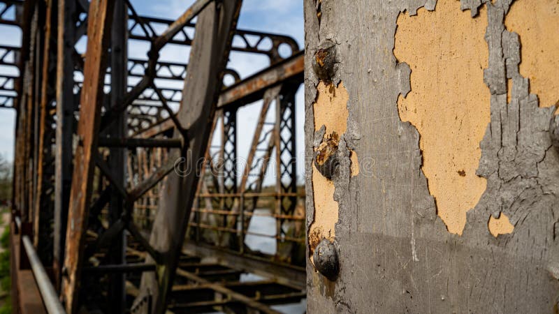 Focus on Flaking Paint on an Iron and Rivets Beam with Old Bridge in ...