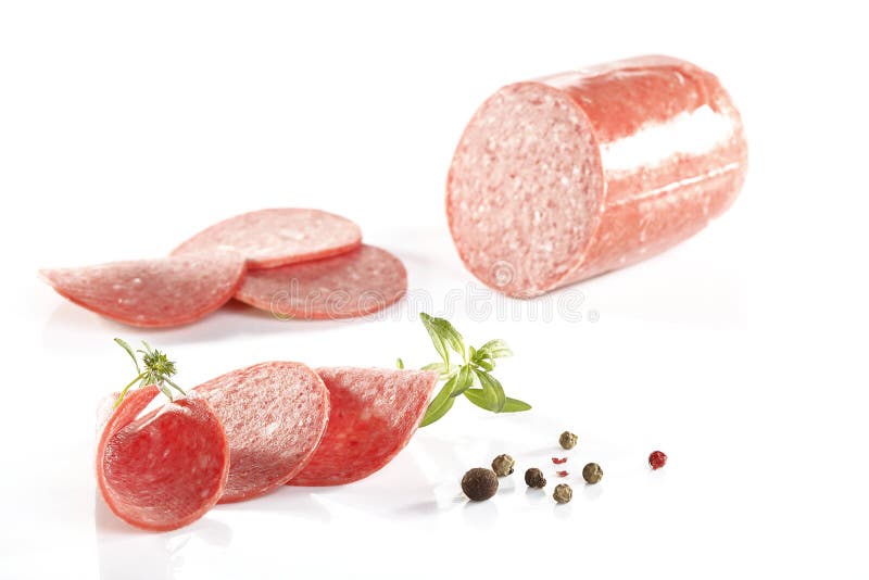 Close-up of Salami Slices and Black and Red Pepper on White Back Stock ...