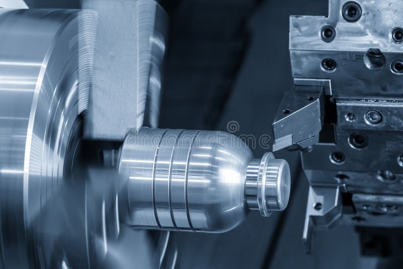 Close Up Scene the Coating Chip Tool for CNC Lathe Machine in the Light ...