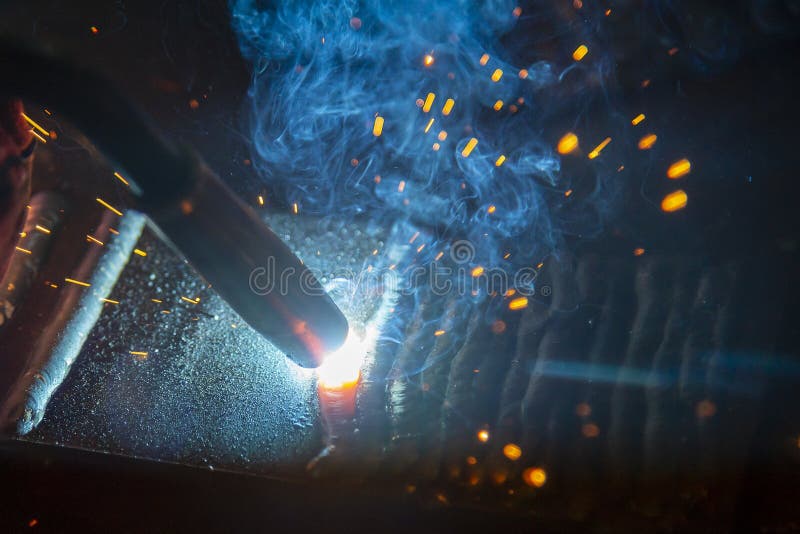 The Electric Welding Process.Arc Welding Process Stock Photo - Image of ...