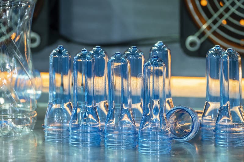 The Close Up Scene of Group of Preform Shape of PET Bottle Products ...