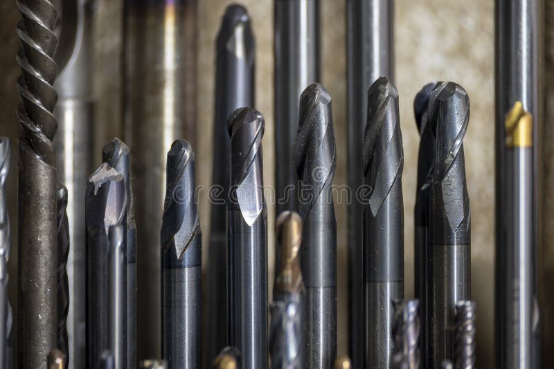 Close-up Scene the Group of Used Cutting Tools for CNC Milling Machine ...