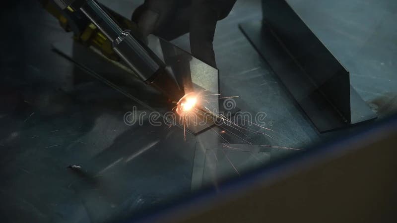 Close Up Scene the Laser Welding Process by Hand Held Laser Welding ...