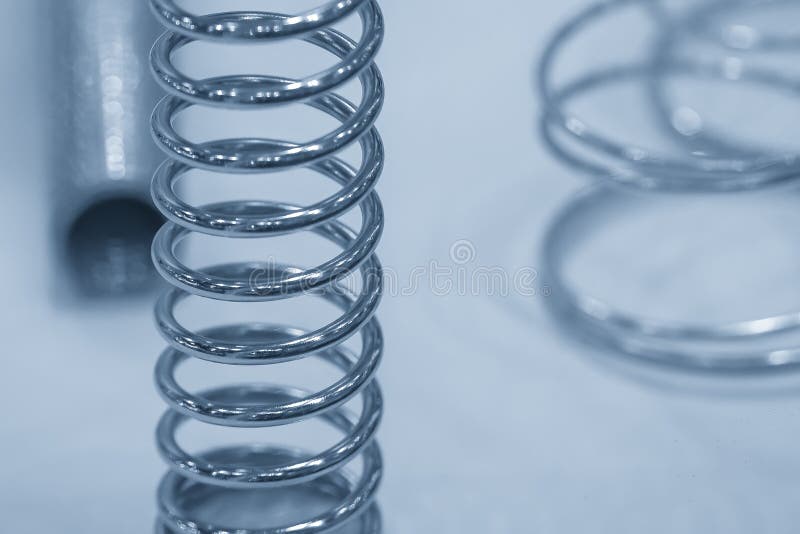 Close Up Scene the Wire Coil Spring in the Light Blue Scene Stock Photo ...