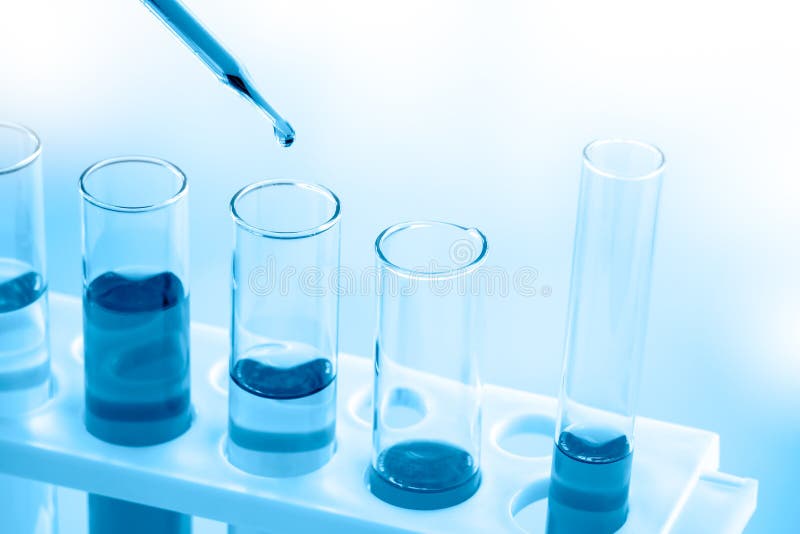 Blue Liquid Substance Was Pouring into Test Tube Stock Image - Image of ...