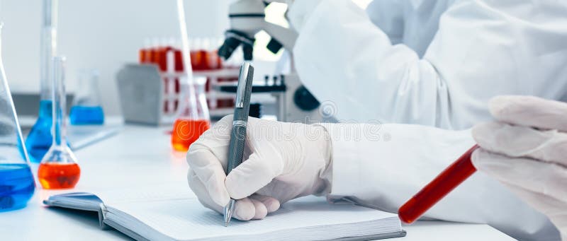 Close Up. a Scientist Making an Entry in a Laboratory Journal Stock ...