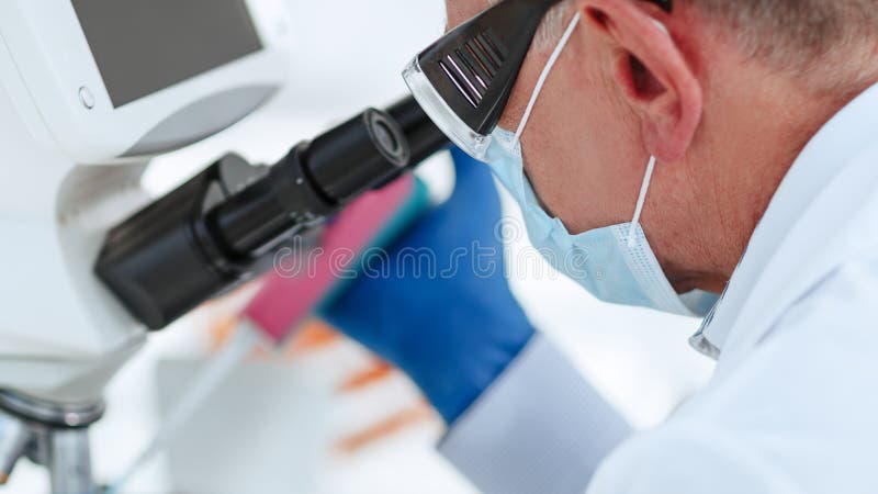 Close Up. Scientist in a Protective Mask Testing Control Samples Stock ...
