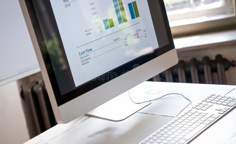 Close-up of the Screens of Personal Computer with Diagram, Statistics ...