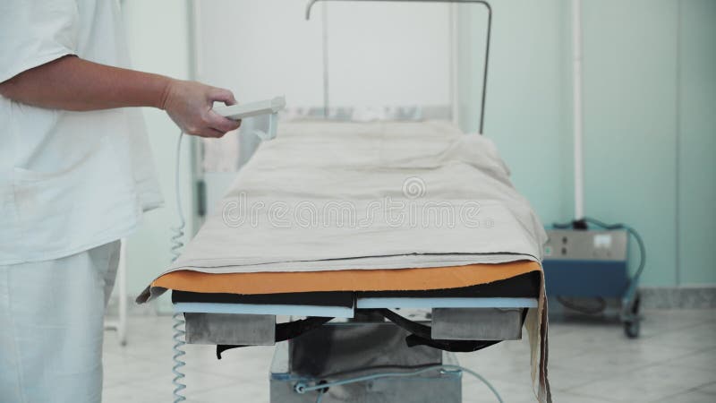 Nurse Pressing Buttons on Remote Control, Surgical Operating Table ...