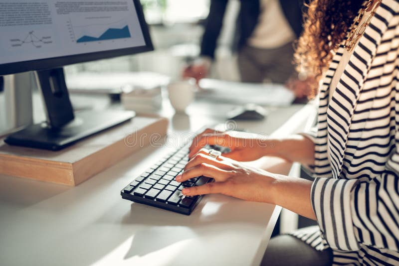 Close Up of Secretary Wearing Striped Jacket Typing E-mail Stock Photo ...