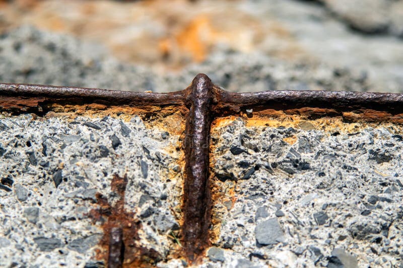 Close-up Selective View of Rusty Old Construction Iron on the Concrete ...