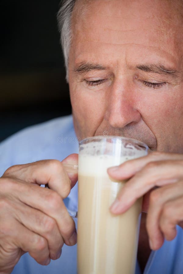 Close Up of Senior Man Drinking Cold Coffee Stock Image - Image of ...
