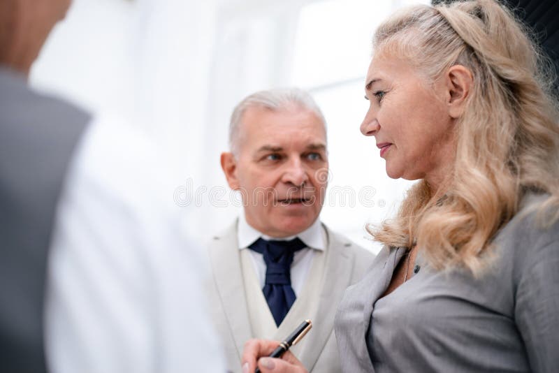 Close Up. Senior Manager Giving Orders To His Assistant Stock Photo ...