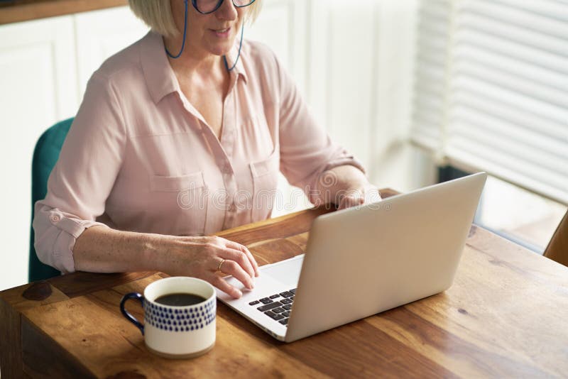Senior Woman Using Computer at Home Stock Photo - Image of life, modern ...