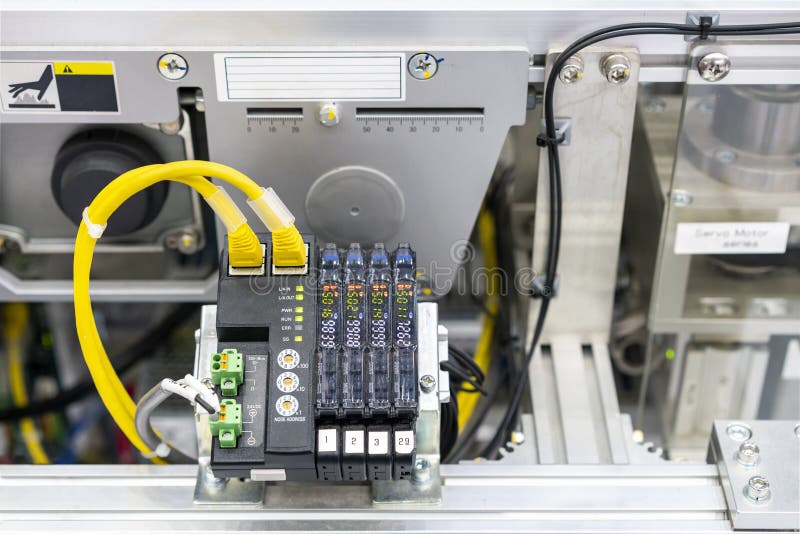 Close Up Fiber Optic Cable Connection with Programmable Logic ...