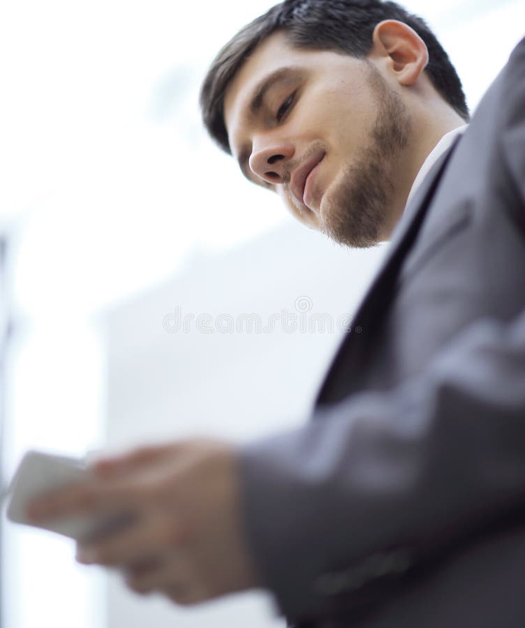Close Up.serious Businessman Reading Text Message on Smartphone Stock ...