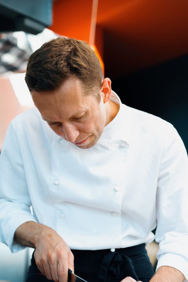 Close-up of a Serious-faced Chef Working in a Professional Restaurant ...
