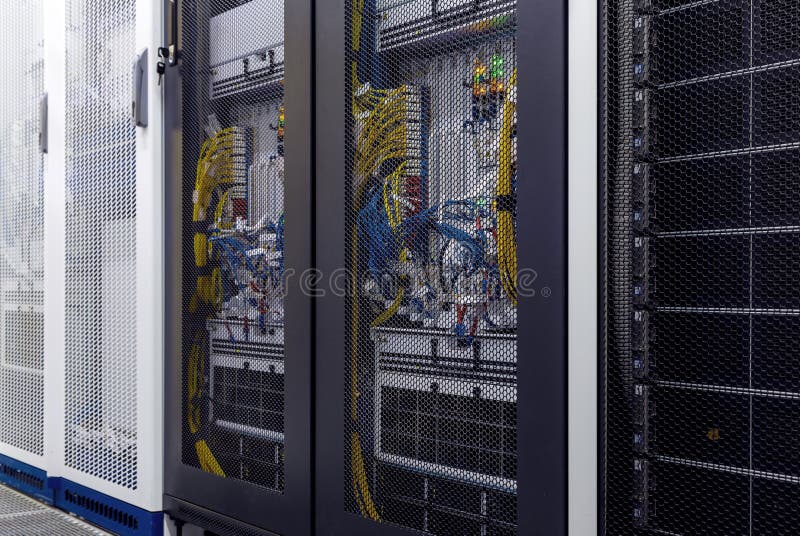 Close Up Server Rack with LED Indicator, Internet Wires, Optic Cables ...