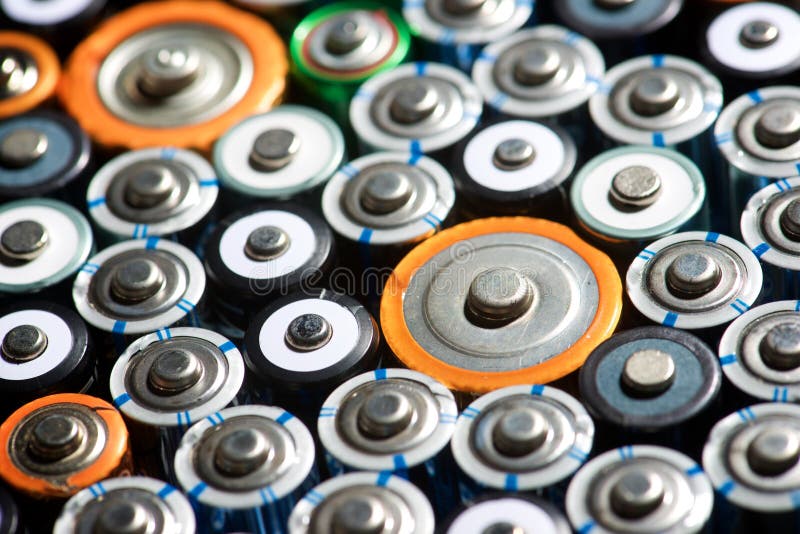 Close-up of AA Batteries on a Smooth Surface. Focus on Battery Detail ...