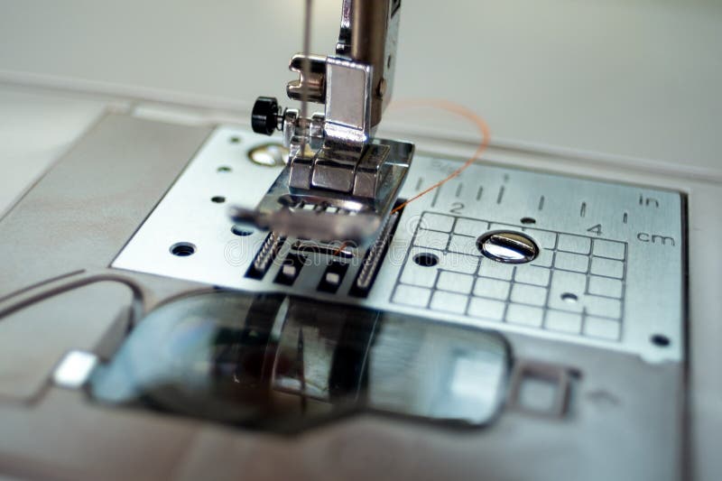 Close Up of Sewing Machine Foot on Modern Machine with Orange Bo Stock ...