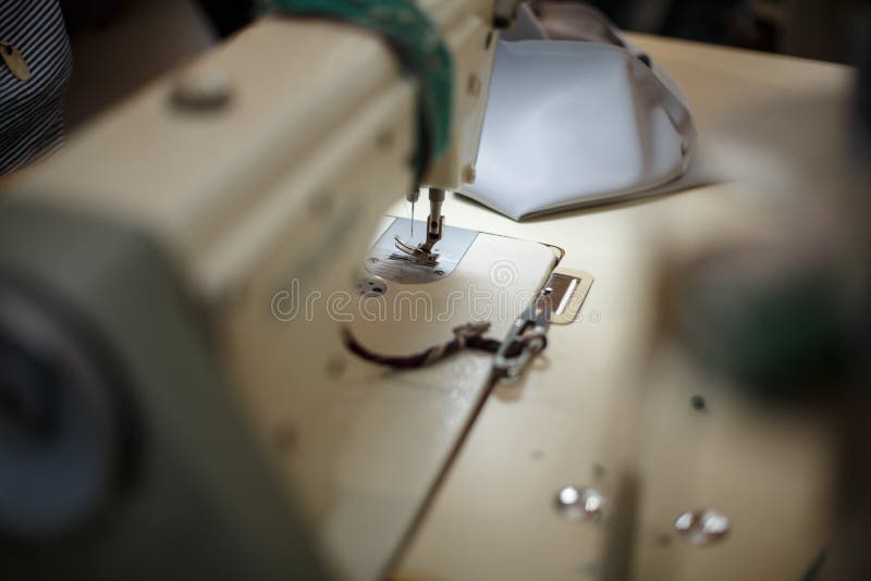 Close-up of a Sewing Machine with Light on. Workplace Tailor Stock ...