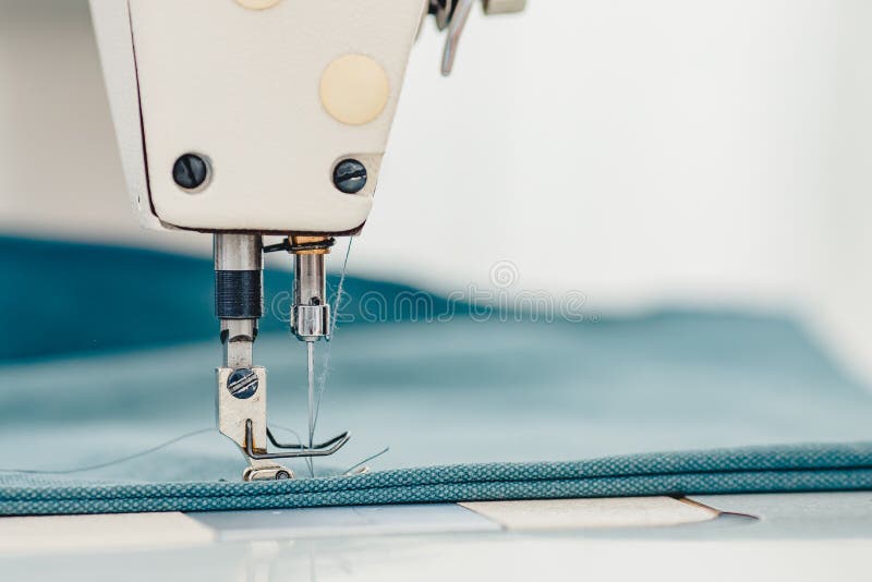 Close-up Sewing Machine Needle with Thread Work. Workplace of Tailor ...