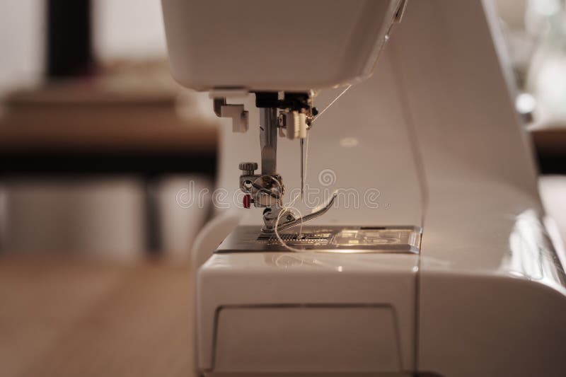 Close-up of Sewing Machine Needle in Warm Light Workshop Stock Image ...