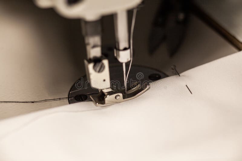 Close-up Sewing Machine Needle and White Fabric Stock Photo - Image of ...