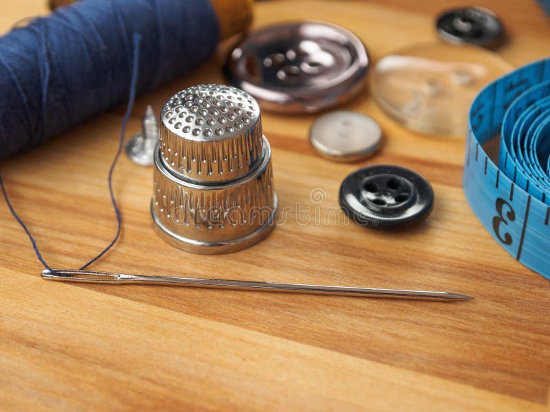 Close-up of a Sewing Needle and Thimble. Detailed Images of Sewing ...