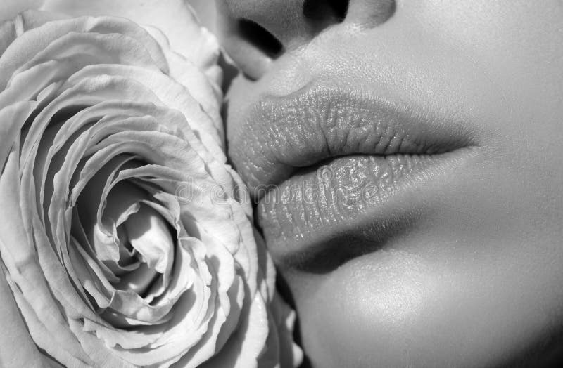 Close Up Woman Natural Lips And Beautiful Red Rose Lips With Lipstick
