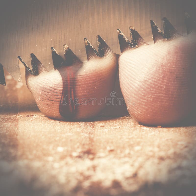Close-up of Sharp Hand Saw Blade and Finger with Red Blood of C Stock ...