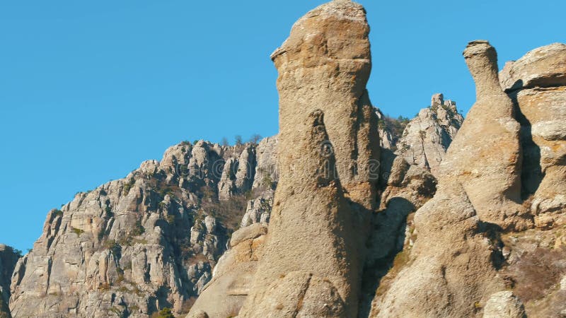 Close-up of Sharp Rock Formation. Shot. Mountains Against Blue Sky ...