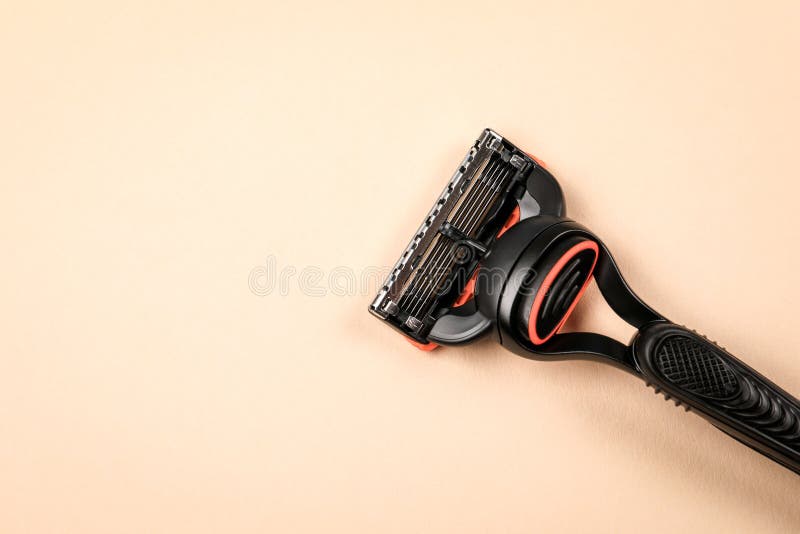 Close-up of a Shaving Razor on a Light Background, with Free Space for ...