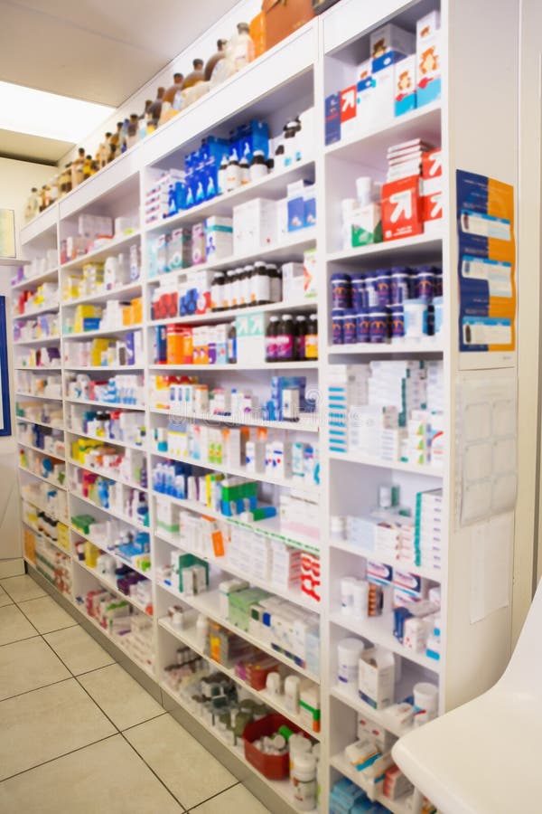 Shelves of Drugs in the Pharmacy with Shopping Cart Stock Photo - Image ...