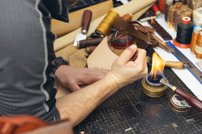 Close Up of a Shoemaker or Artisan Worker Hands. Leather Craft Tools on ...