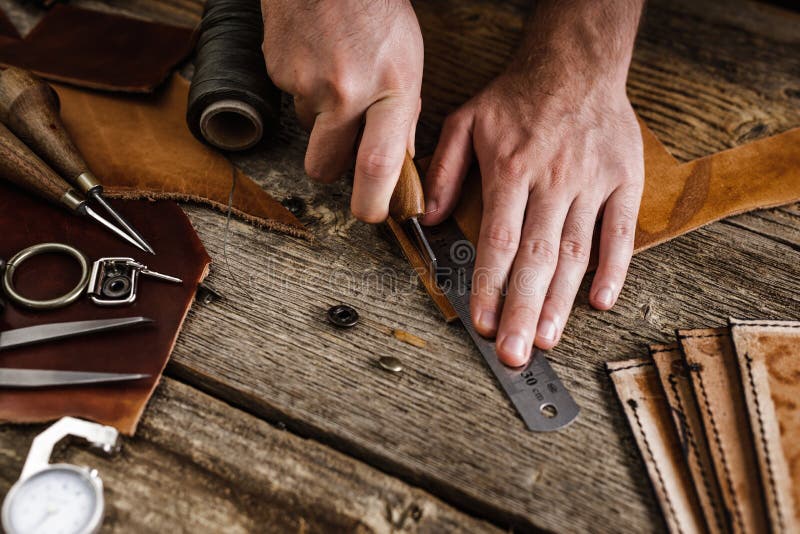 Close Up of a Shoemaker or Artisan Worker Hands. Leather Craft Tools on ...