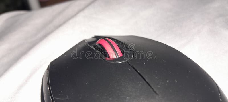Close-up Shot of a Black Gaming Mouse with a Red-accented Scroll Wheel ...
