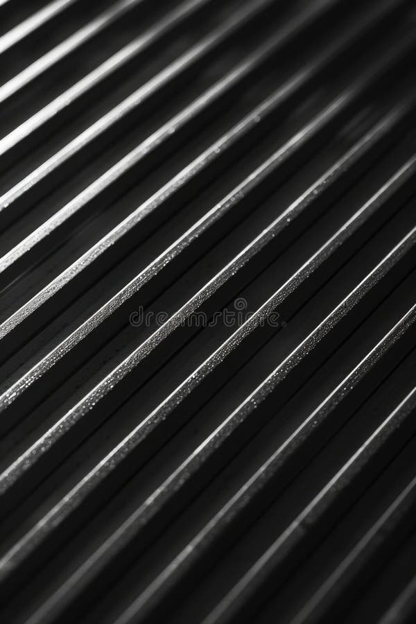 A Close-up Shot of a Black and White Grill with Texture and Details ...
