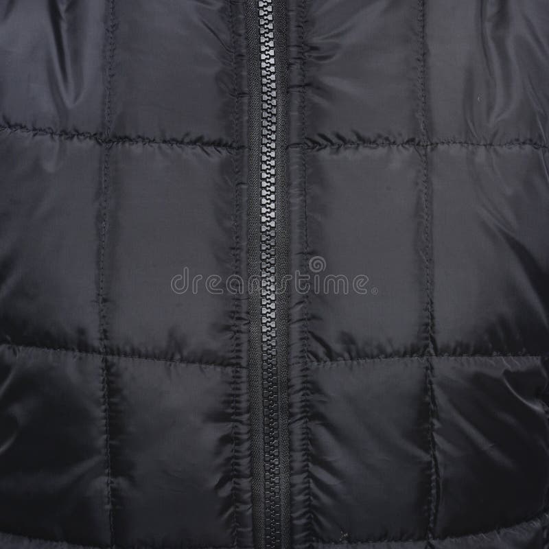 Close Up Shot Of Black Zip Up Quilted Textile Stock Image - Image of ...