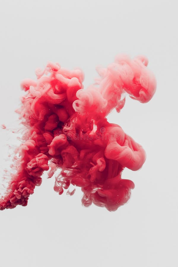 Close Up Shot of Bright Red Paint Splash in Water Isolated on Gray ...