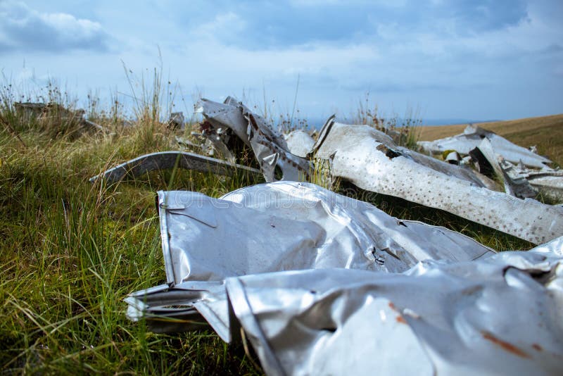 Close-up Shot of Broken Metallic Pieces in the Grass Stock Image ...