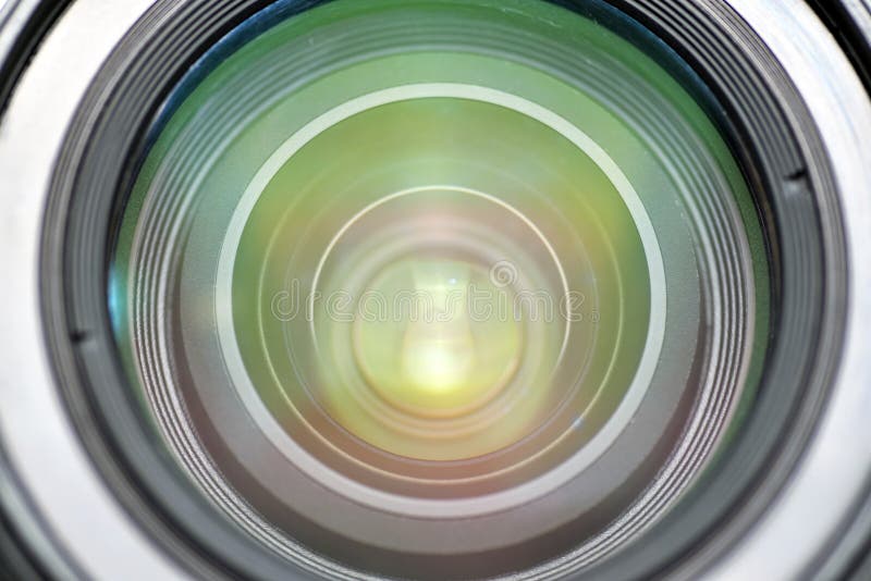 A Close-up Shot of a Camera Lens Reflecting Light in a Mesmerizing ...
