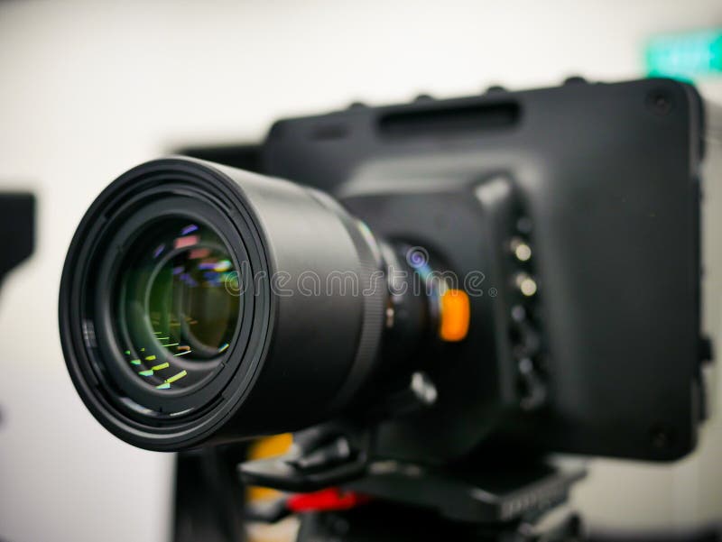 Close Up Shot of Camera Lens Set Up Filming in the Studio. Reflection ...