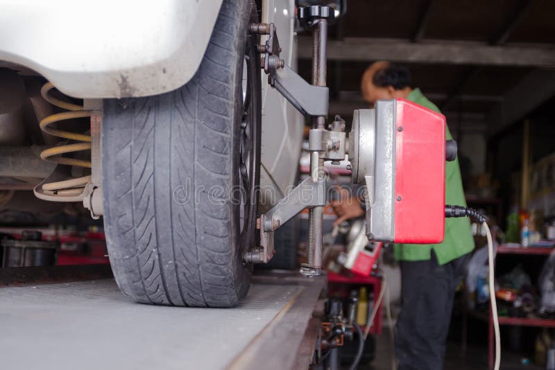 Close Up Shot of Car Wheel Centering Machine Adjustment Selective Focus ...